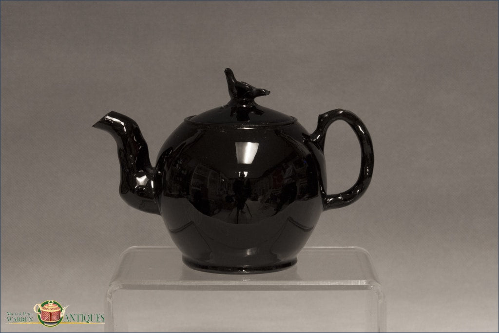An Antique English Jackfield Teapot and cover with bird knop, c1780-90 ...